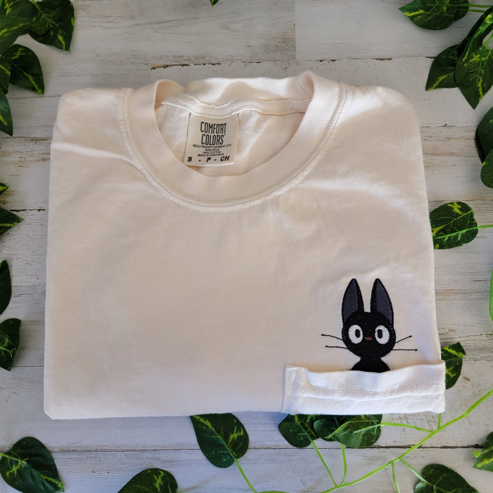 Jiji Cat Pocket Tee | Embroidered Subtle Anime Merch | AFK Apparel